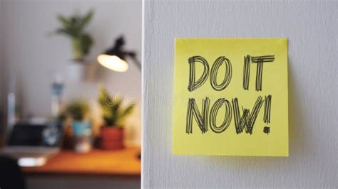 A Bright Yellow Post It Note With The Words Do It Now Handwritten In