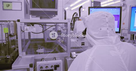 Clean Room Manufacturing Of Silicon Wafers For The Semiconductors Industry Moment Stock Image