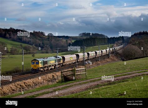 Freightliner Class 66 Diesel Locomotive 66957 Hauling A Merry Go Round