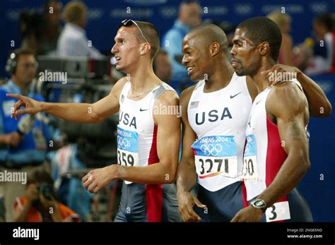 Jeremy Wariner Of The United States Left Celebrates After Winning