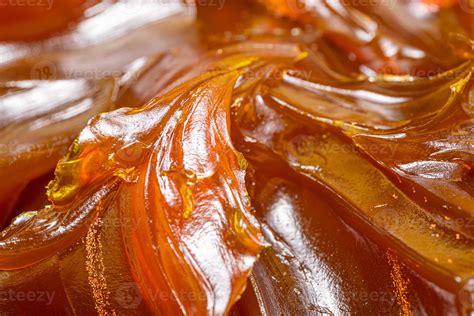Close Up Of Orange Colored Industrial Grease Rich And Thick Texture Of Industrial Grade Grease