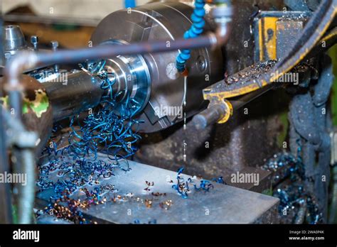 The Cnc Milling Machine Cuts Metal Parts With A Milling Machine And