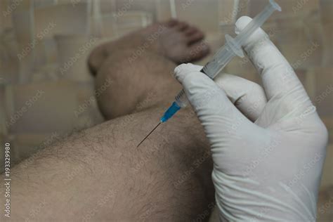Poster Injection Of A Syringe Into The Muscle Of The Thigh Wall Art