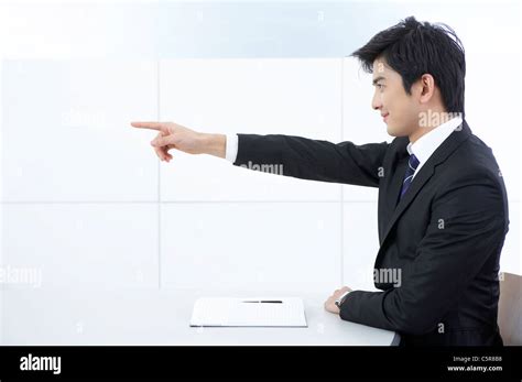 A Man Pointing Something Stock Photo Alamy