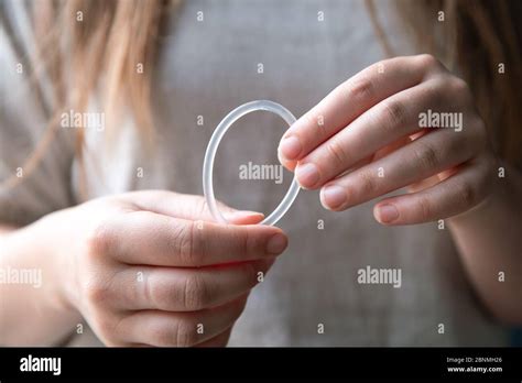 Womans Hand Holding A Birth Control Ring Vaginal Ring For