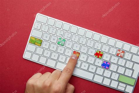 cropped view man pushing buttons ts computer keyboard red background