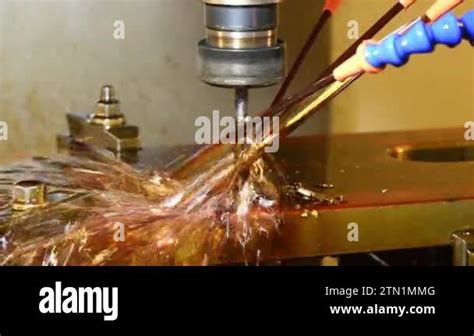 the canned cycle drilling process on the cnc milling machine with oil