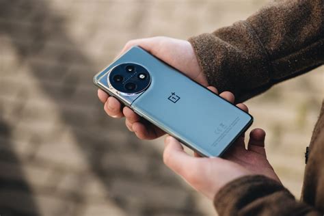 Oneplus 11 Flaunts Its Curving Glass And Metal Body Cnet