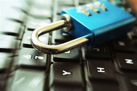 Cyber Security With Blue Combination Lock On Computer Keyboard With