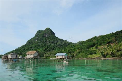 Bajau Laut Coastal Village With Stilt Houses And Canoe Editorial Stock