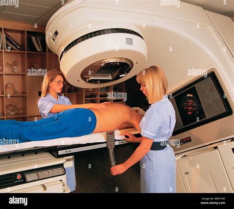 Young Woman Radiotherapist Positioning Radiotherapy Linear Accelerator