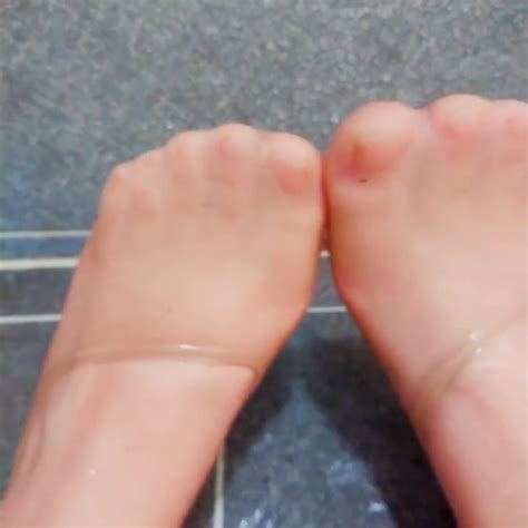 Asian Girl Taking A Foot Shower