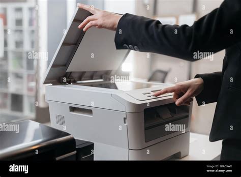 Business Woman Is Using The Printer To Scanning And Printing Document Stock Photo Alamy