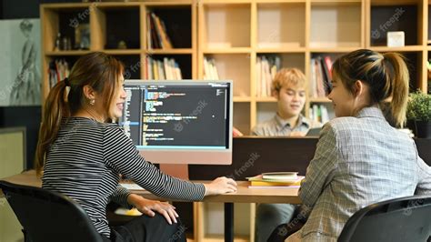 Premium Photo Team Of Software Development Brainstorming Working With