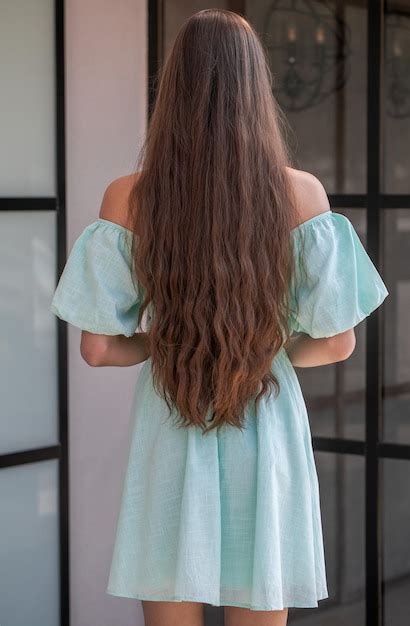 Brunette Female Hair Back Turquoise Summer Dress Premium Photo