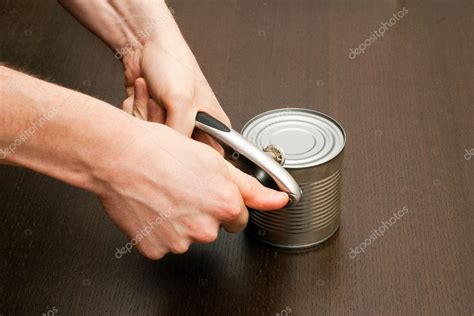 Using Can Opener Stock Photo Timbrk