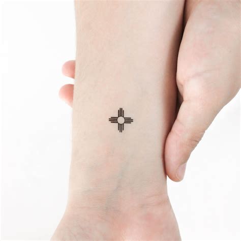 Red Zia Symbol Tattoo