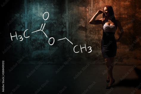 Sexy Girl Or Secretary Or Female Babe Presenting Handdrawn Chemical Formula Of Ethyl Acetate