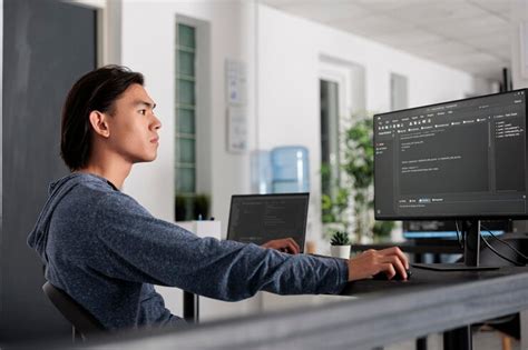 Premium Photo It Engineer Using Programming Computer To Write Html Code On Terminal Window