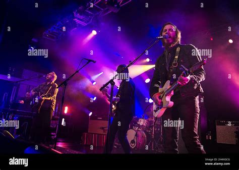 Dallas Green Dante Schwebel And Jack Lawrence Of City And Colour Performing On Stage At The 02