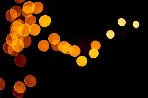 Premium Photo Bokeh Effect Golden Abstract Black Background