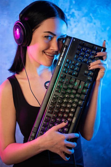 Funny Nerd Gamer Girl Posing With Gaming Keyboard Playing Computer