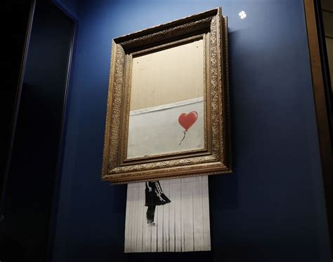 Banksys Shredded Girl With Balloon Renamed And Redated—again