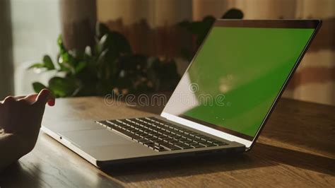 Woman Hand Random Scroll Down On A Laptop Computer Touchpad With Green Screen Chroma Key Stock