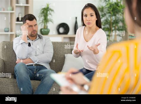 couple talking over their problems to a marriage guidance therapist ...