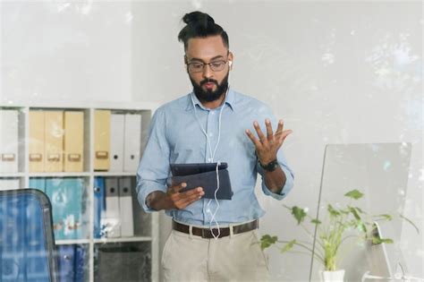 Premium Photo Man Working While Checking His Device