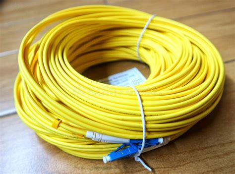 LC LC Duplex Single Mode PatchCord Fiber Optic Patch Cord In One Roll On A Vinyl Floor Stock