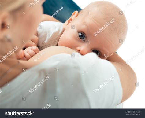 Baby Feeds On Mom S Breasts Stock Photo Shutterstock