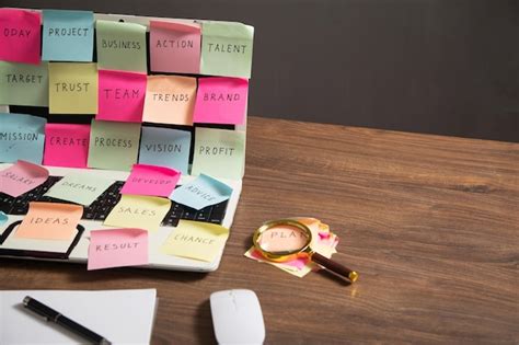 Premium Photo Laptop Computer With Colorful Sticky Notes Business