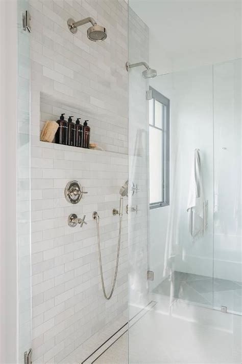Spacious Walk In Shower Features White And Gray Glazed Subway Tiles