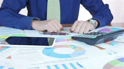 Man Analyzing The Charts Free Stock Video