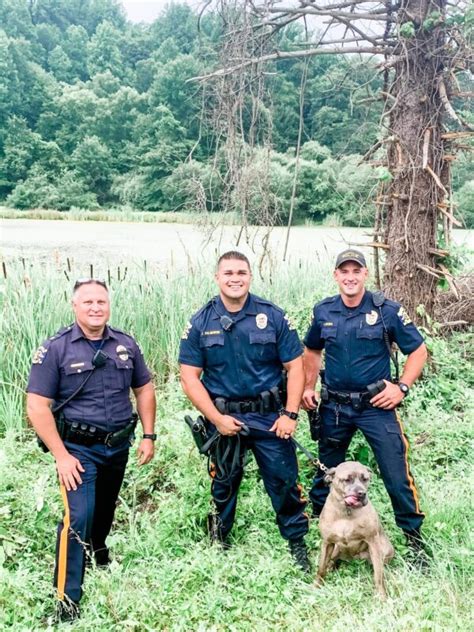Police Officer Uses Kayak To Save Dog From Drowning In Muddy Pond