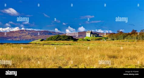 A Panoramic View Of Duntrune Castle Overlooking Loch Crinan In The
