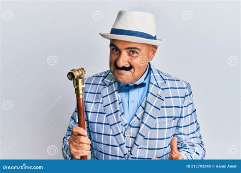 Mature Middle East Man With Mustache Wearing Vintage And Elegant
