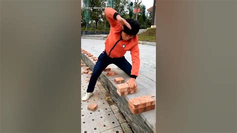 🥋🧱 Kung fu master smashes 50 bricks with bare hand in over 30s - YouTube
