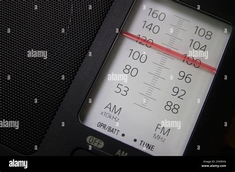 image of an analogue dial on a portable radio with lines and markings