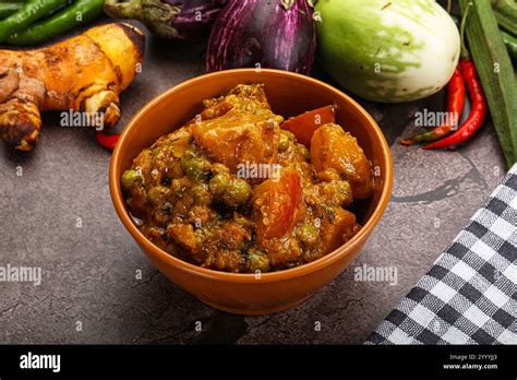 Indian Traditional Cuisine Aloo Mutter Potato With Green Peas Stock