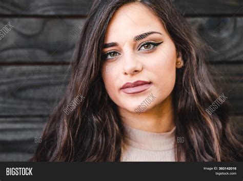Pretty Girl With Brown Hair And Hazel Eyes
