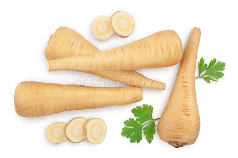 parsnip root and slices with parsley isolated on white background with