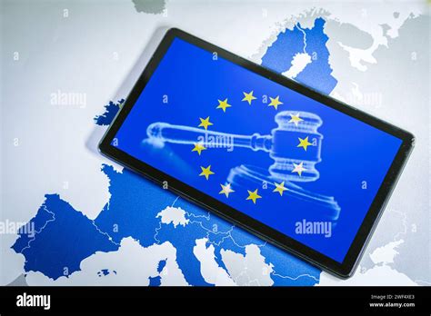 Eu Flag With Gavel And Sound Block On Smartphone Screen Over A Eu Map