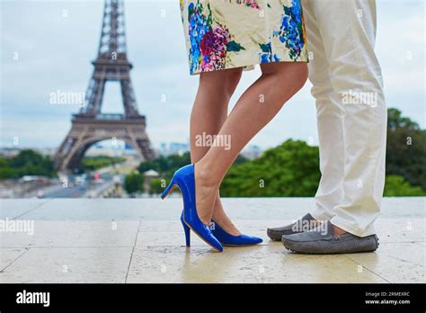 Romantic French Couple Having A Date Near The Eiffel Tower Closeup Of