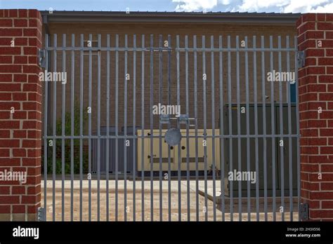 A Locked Security Gate Industrial Machines And Building In Rural