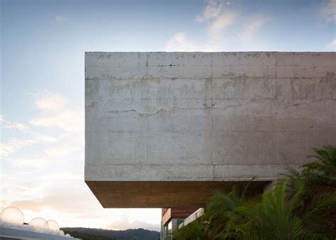 Cantilevered Concrete Box Houses Poolside Bar At Casa Cor