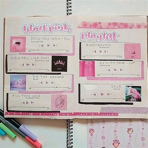 An Open Notebook With Pink And White Designs On It