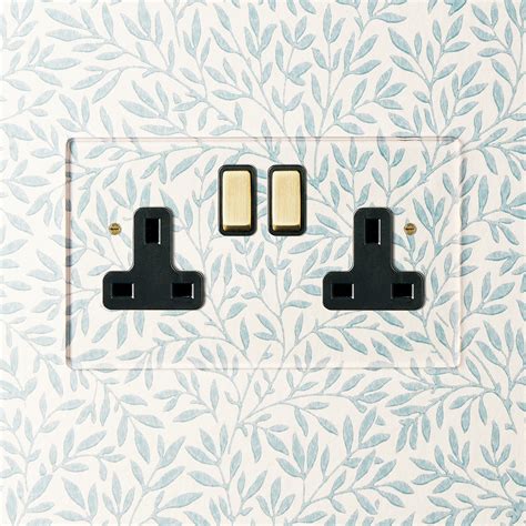 lucian perspex double socket in clear perspex with black inserts and a