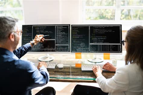 Man Programming Code On Computers Stock Image Image Of Page Internet 58557229
